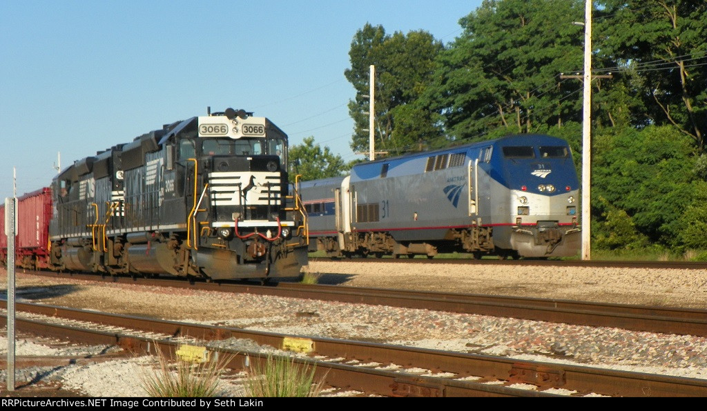 NS 3066 with BO5 in the siding as AMTK 31 brings up the rear of #354